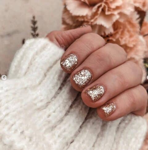 Shine Bright with These 50 Glamorous Gold Glitter Nail Ideas!