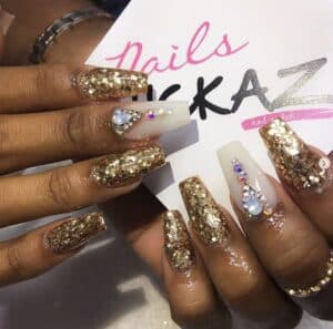 Shine Bright with These 50 Glamorous Gold Glitter Nail Ideas!