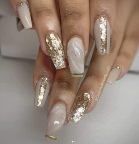 Shine Bright with These 50 Glamorous Gold Glitter Nail Ideas!