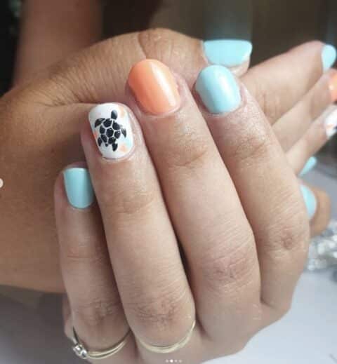 Make a Splash with 35 Captivating Turtle Nail Designs!